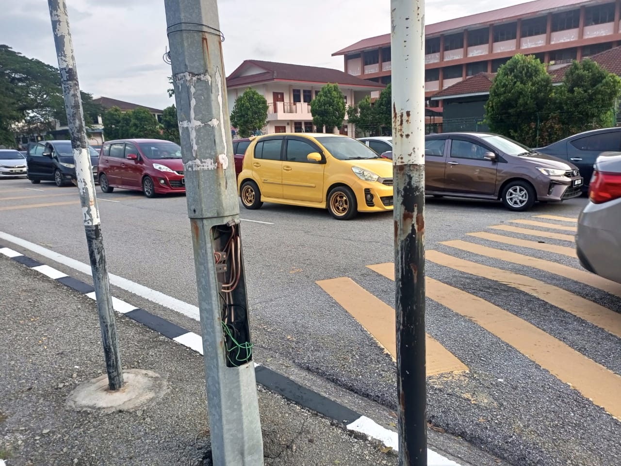Safety Concern: Uncovered Lamp Posts Near School Raise Alarm | Ipoh Echo